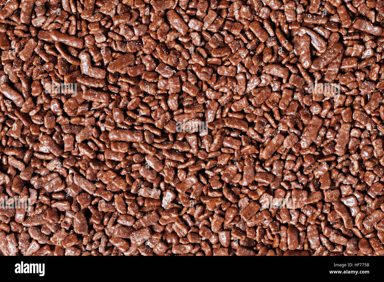 Chocolate sprinklers texture background Stock Photo - Alamy