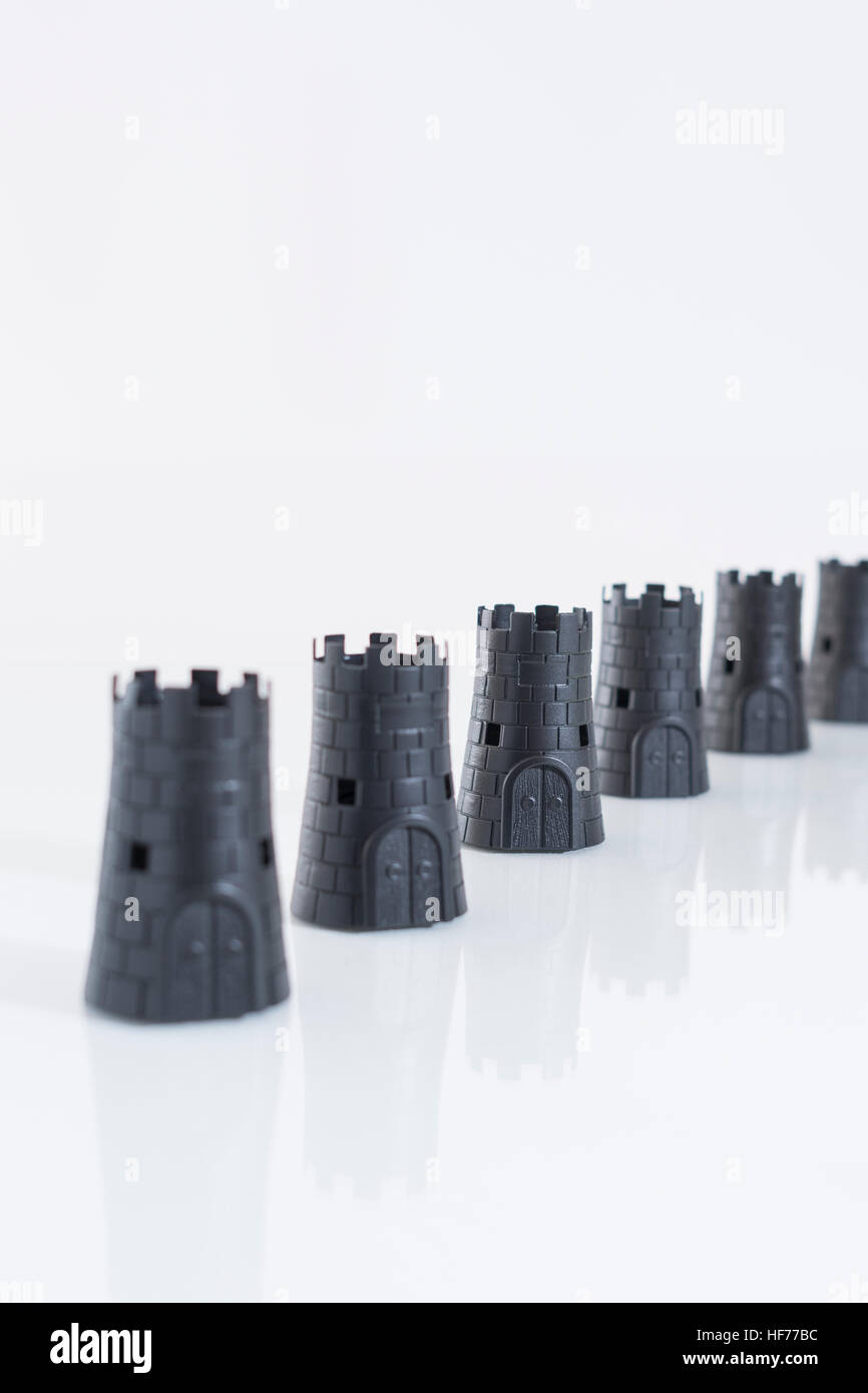 Row of black castellated turrets For strong defence, defensive line ...