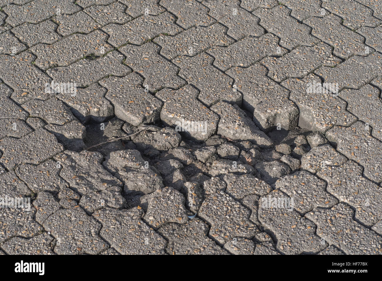 Industrial yard / brick road surface with pothole. Potential for ...