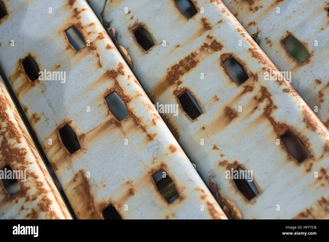 Rusting beams / stantions of an industrial racking / shelving system ...