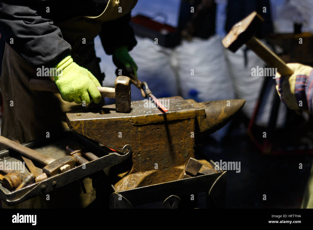 blacksmith forges iron Stock Photo - Alamy