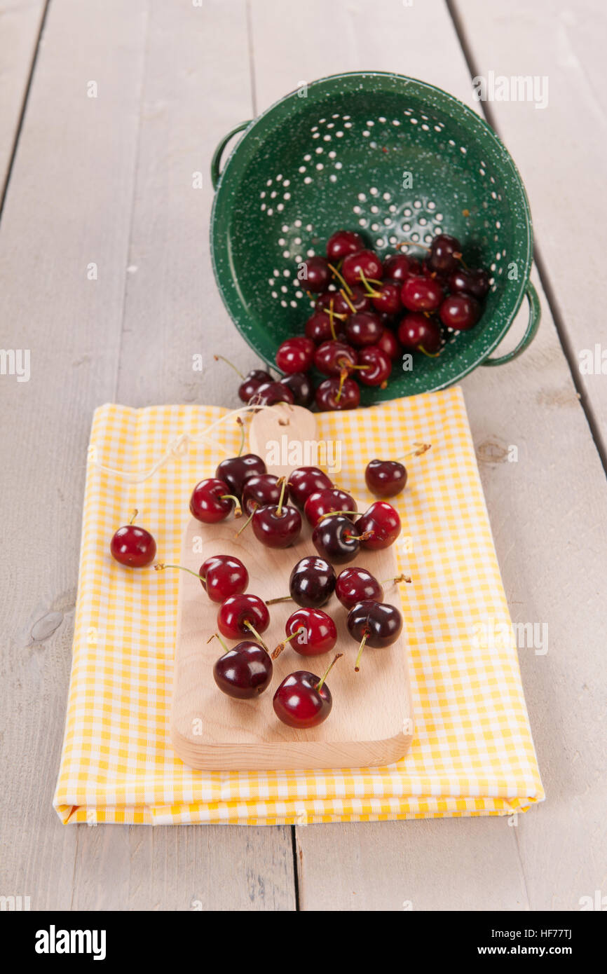Fresh washed cherries on wooden underground Stock Photo - Alamy