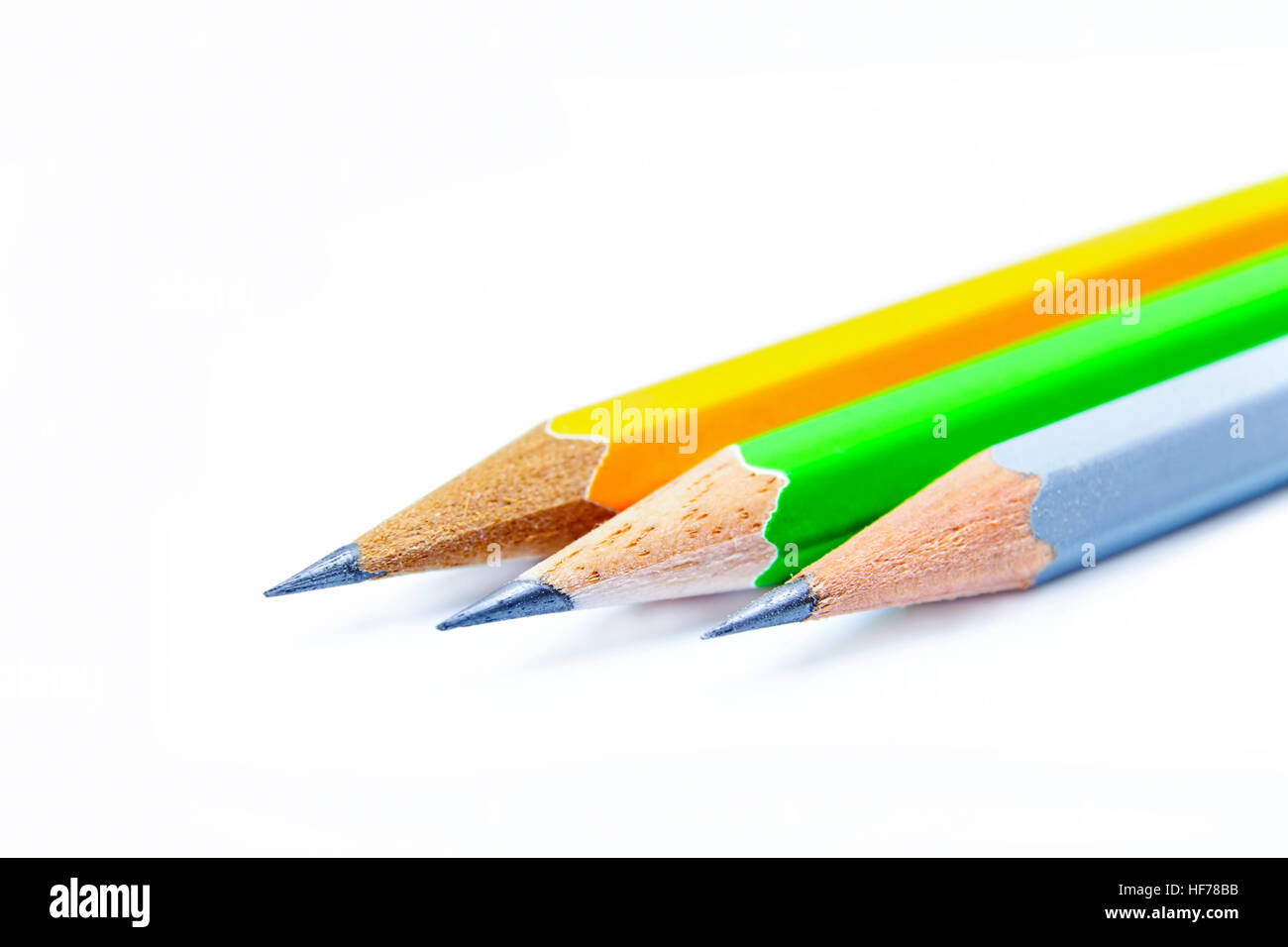 Three isolated colour pencils Stock Photo - Alamy
