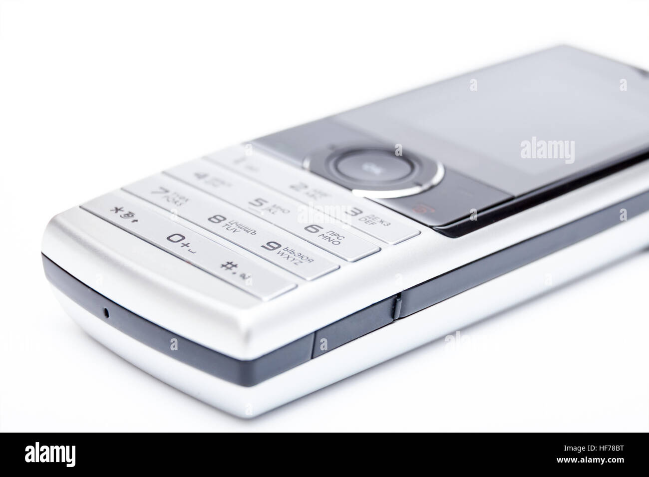 Mobile phone in it is light grey tones on the white isolated background ...