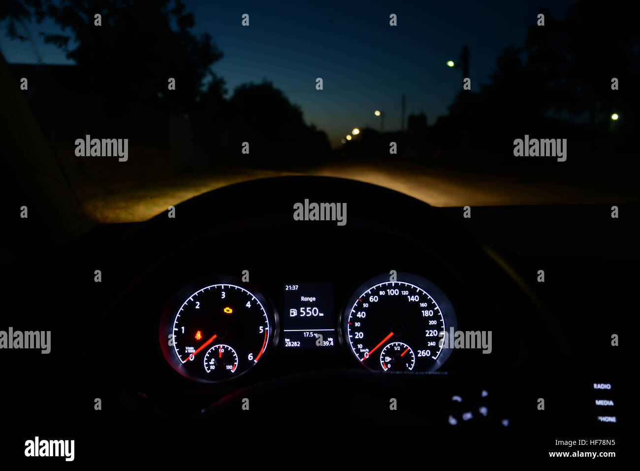 Driving car at night Stock Photo - Alamy
