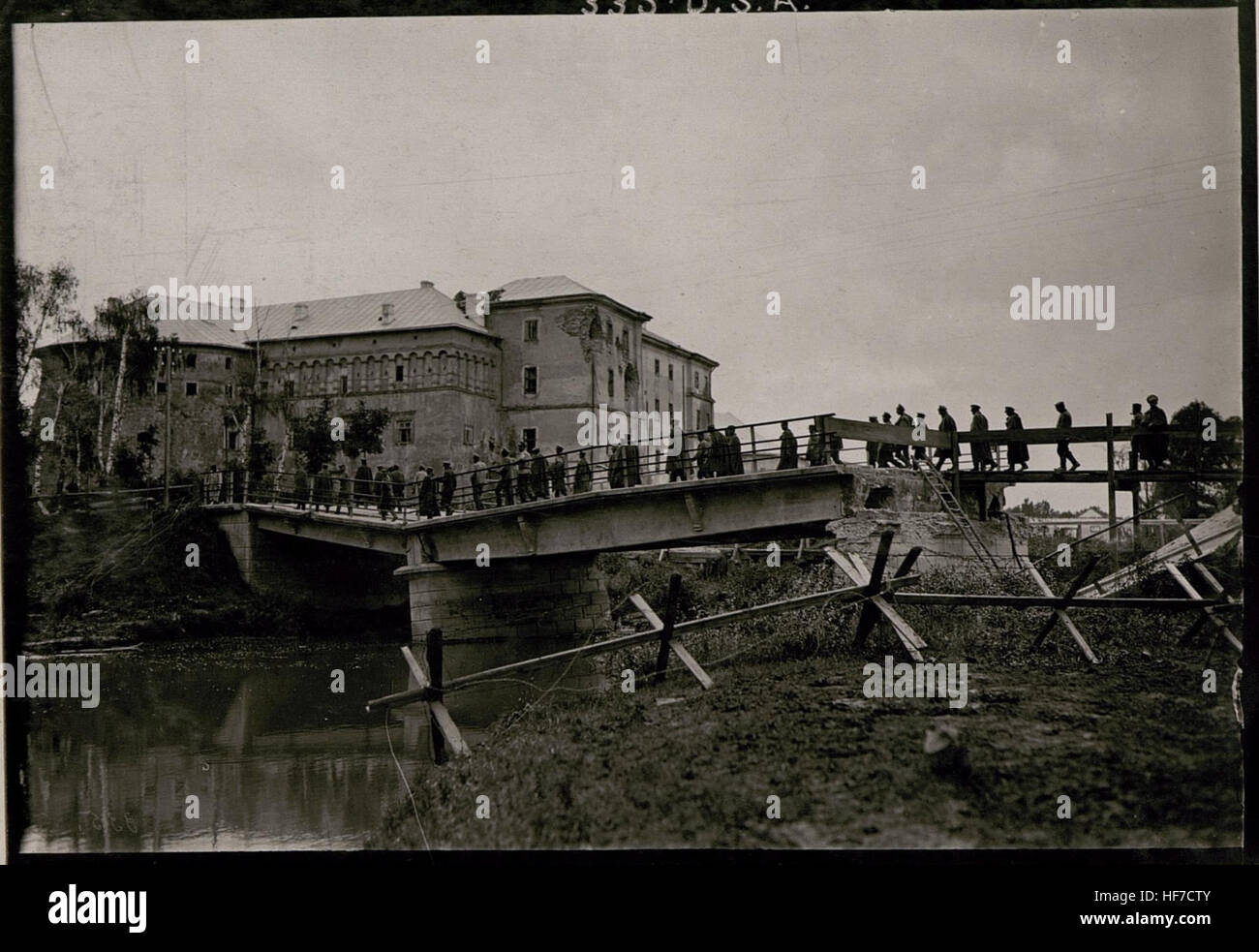 A photograph of a destroyed reinforced concrete bridge at Zlota Lipa in ...