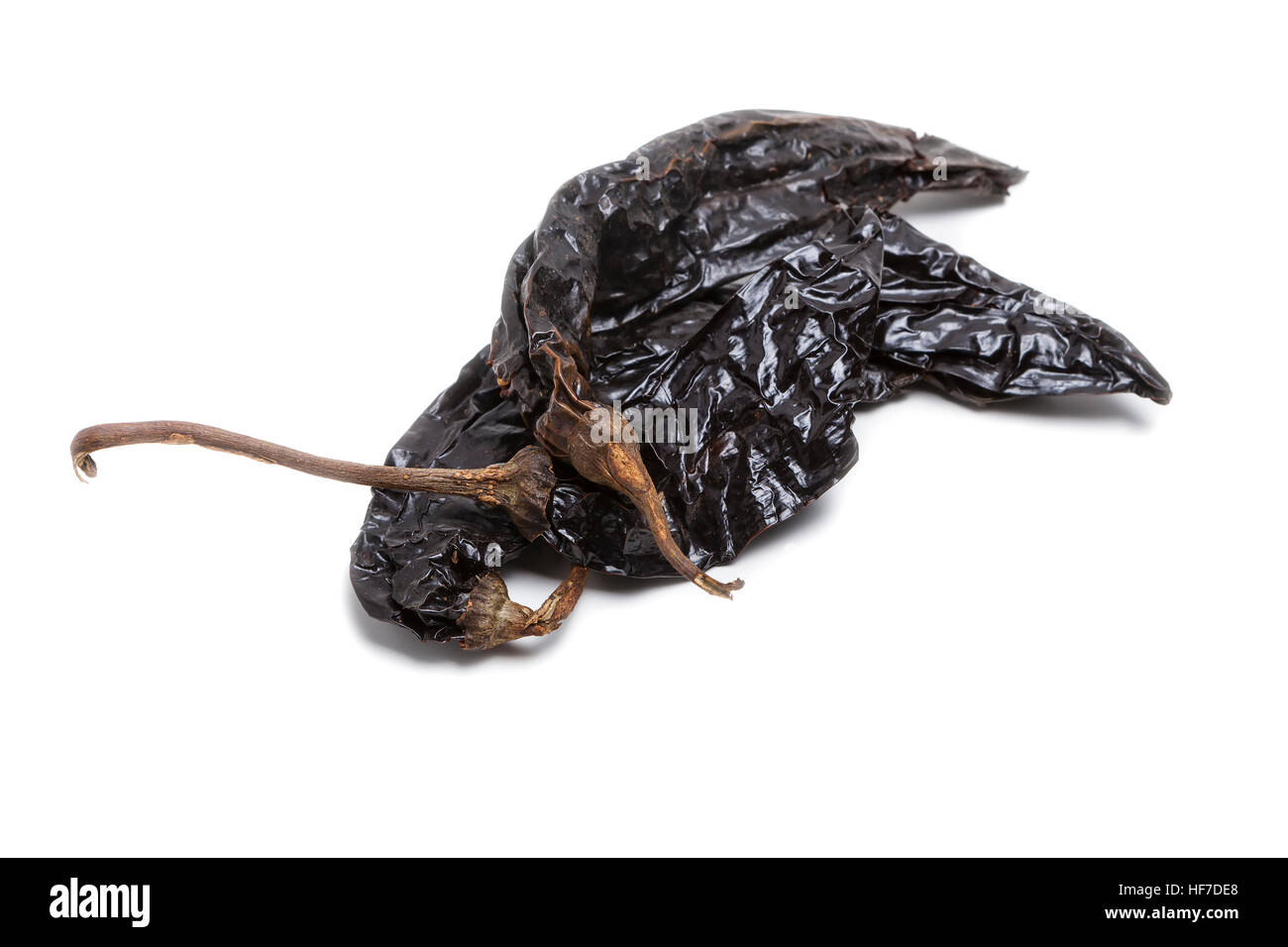 Dried black pasilla chili pepper isolated on white background Stock ...