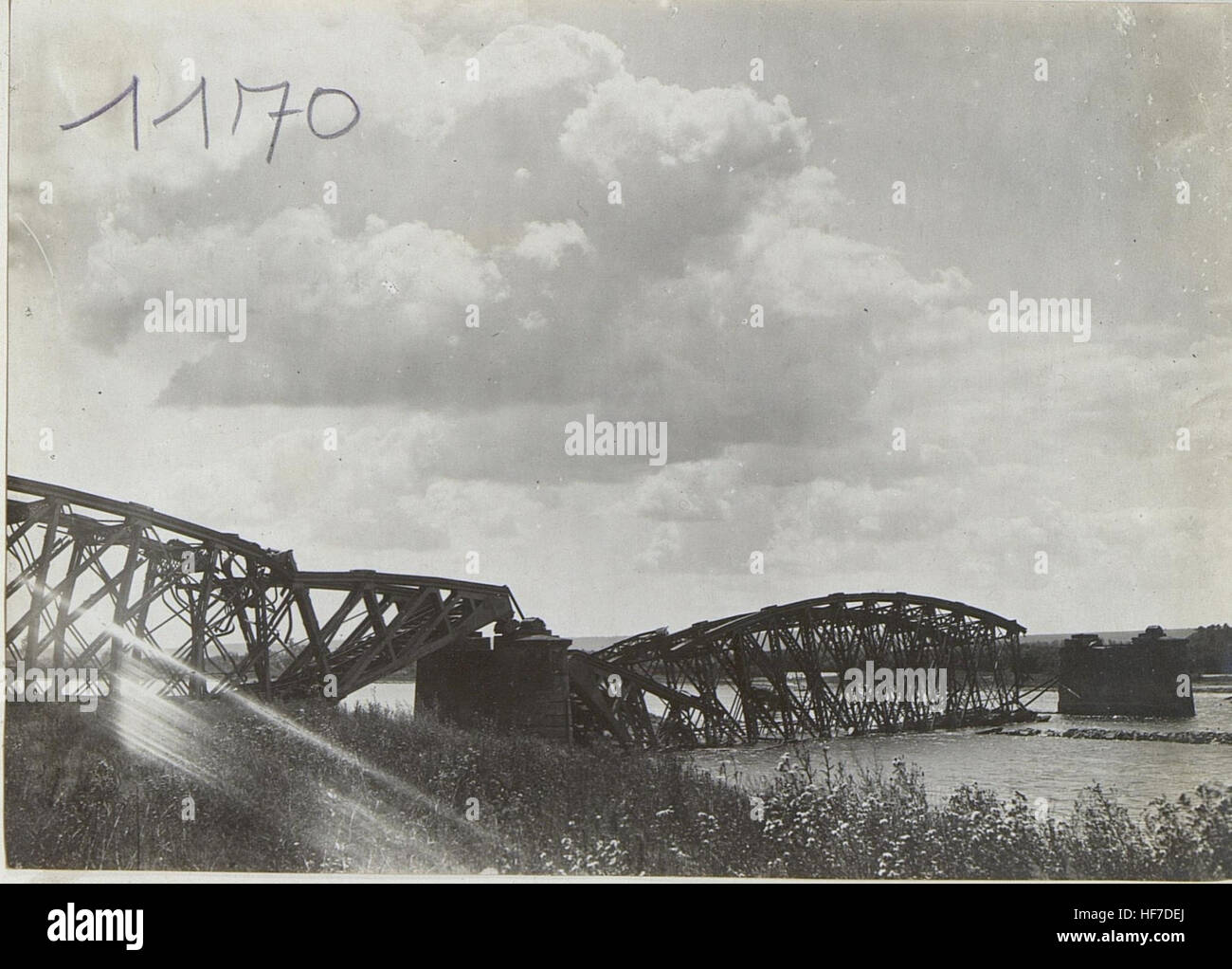 Blown-up railway bridge at Jezupol on the Dniester River, captured ...