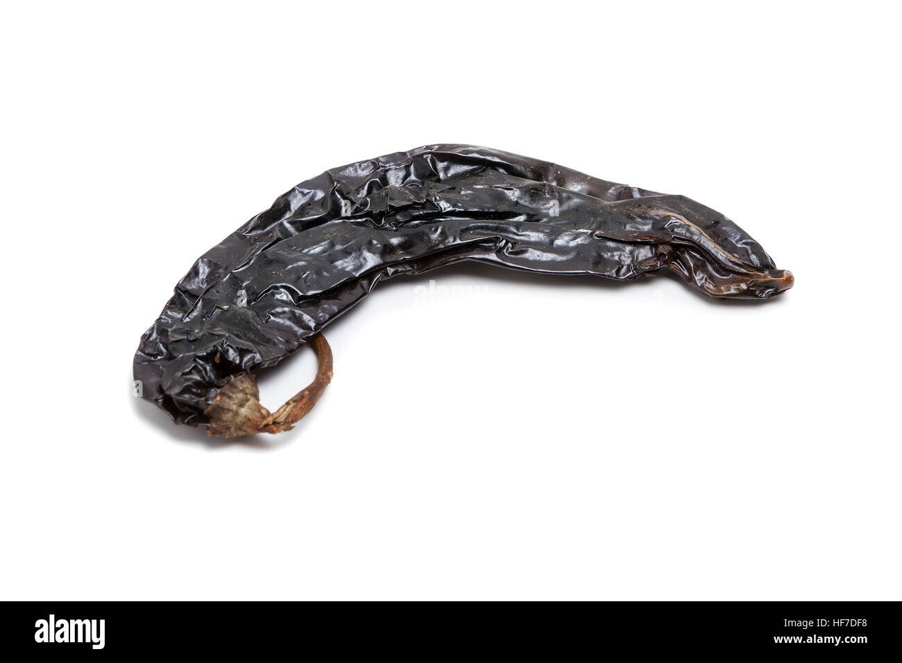 Dried black pasilla chili pepper isolated on white background Stock ...