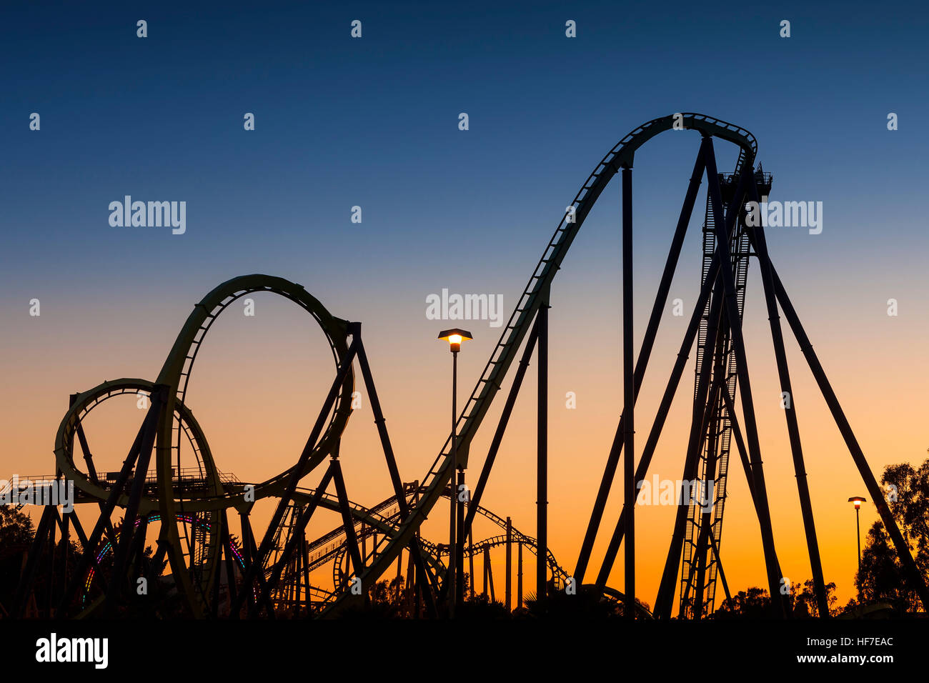 Roller Coaster Silhouette at Sunset Stock Photo - Alamy