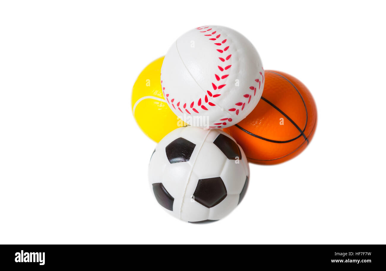 Four toy sports balls isolated on white background Stock Photo - Alamy