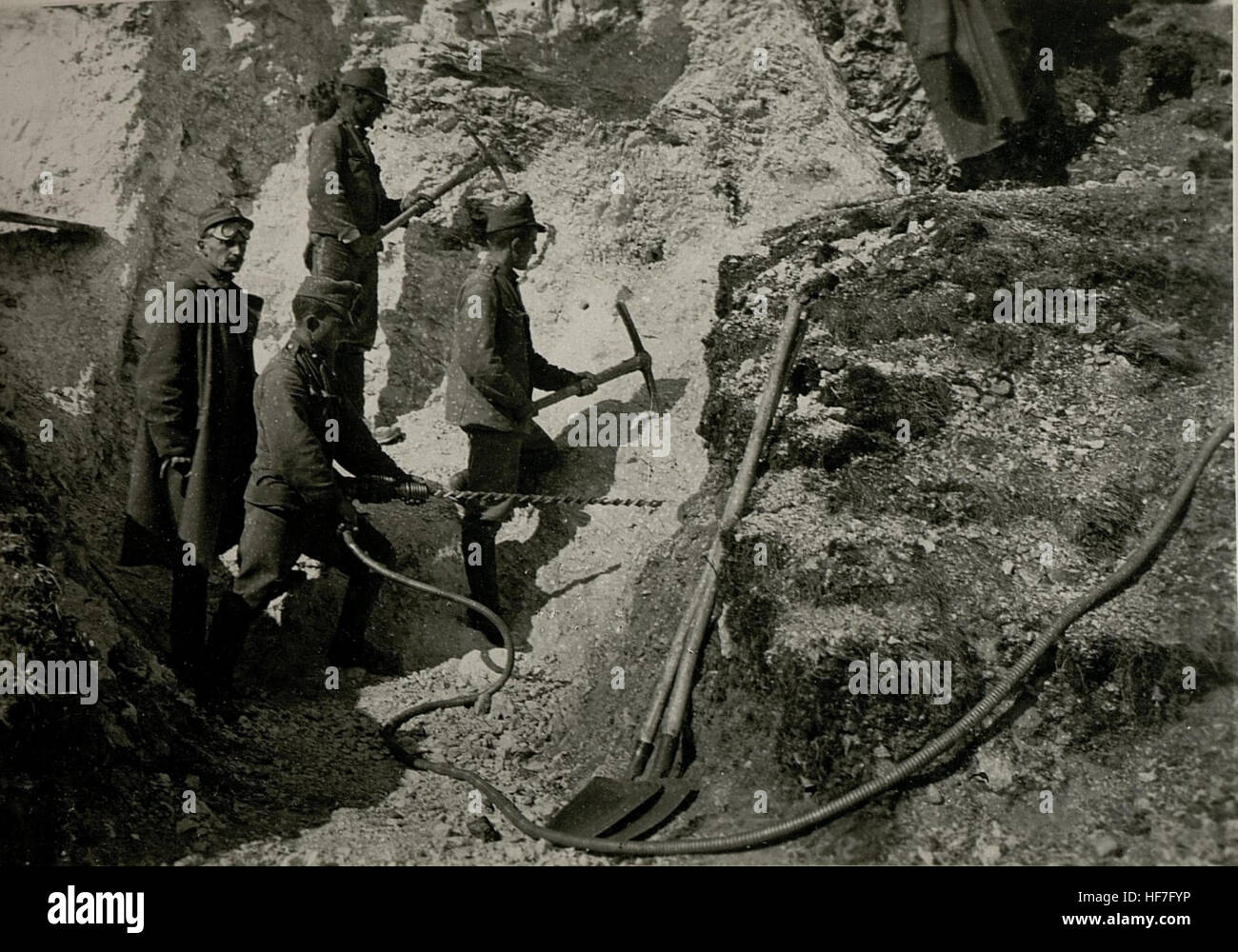 The image depicts a geological drilling machine from World War I ...