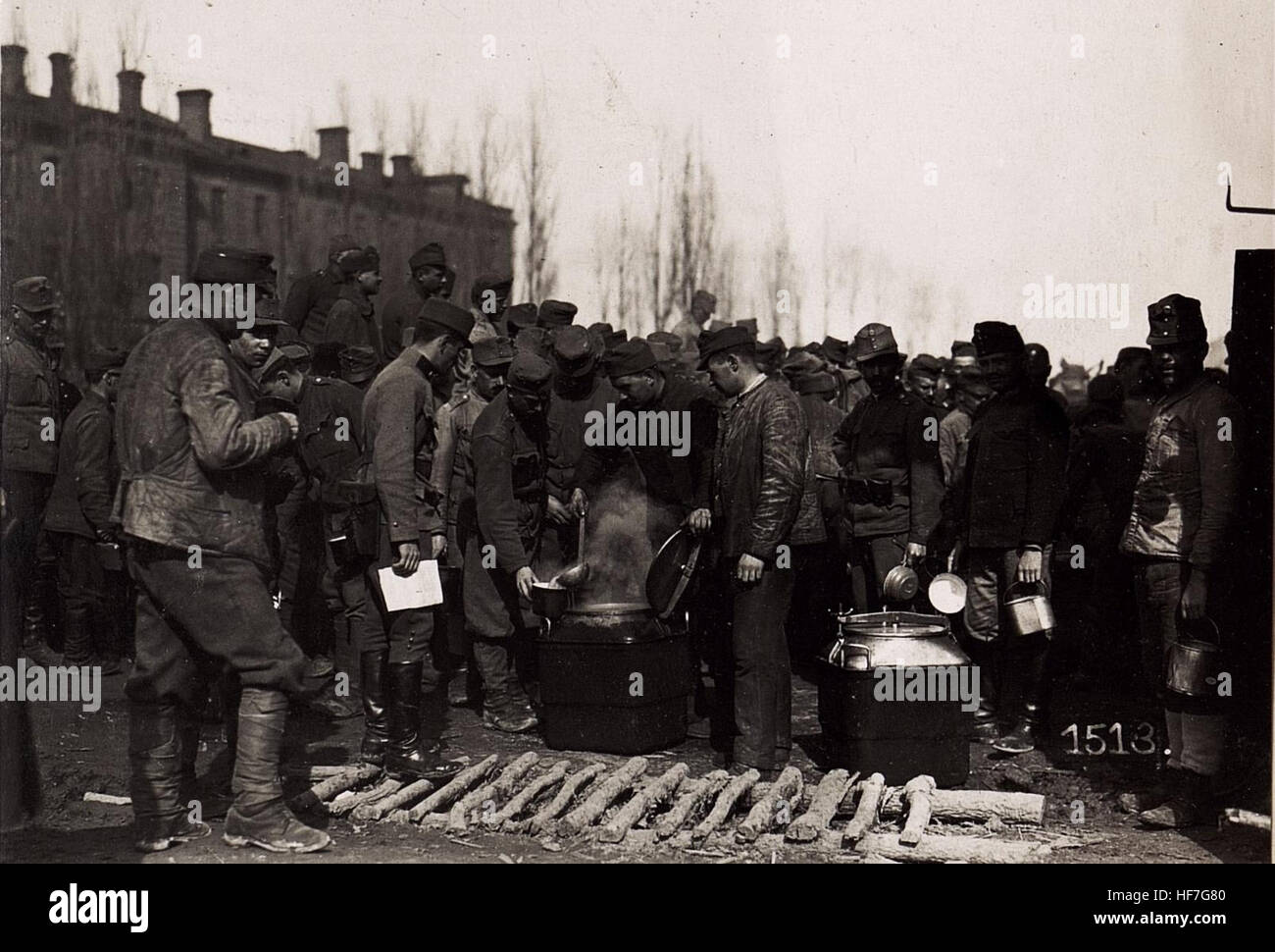 This historical photograph captures soldiers returning to the ...