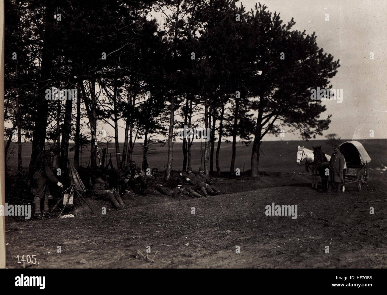 A photograph documenting a scene from World War I, showing military ...