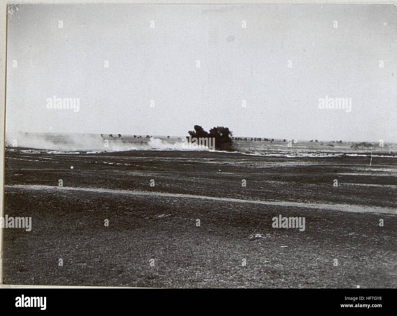 This World War I-era photograph shows a *Flammenwerfer* (flamethrower ...