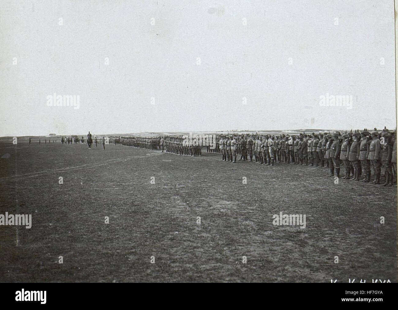 A historical image showing a military parade during World War I ...