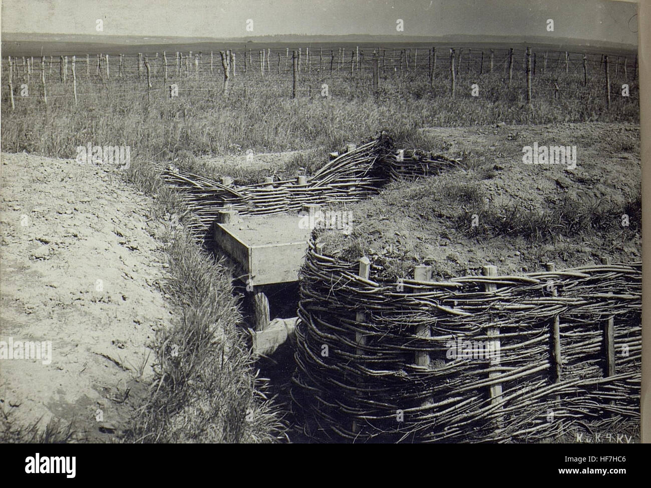 A photo from World War I showing an open machine gun position with an ...