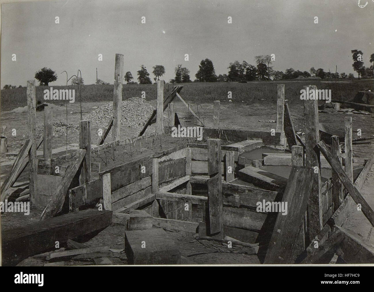 This image depicts a concrete artillery observation post under ...