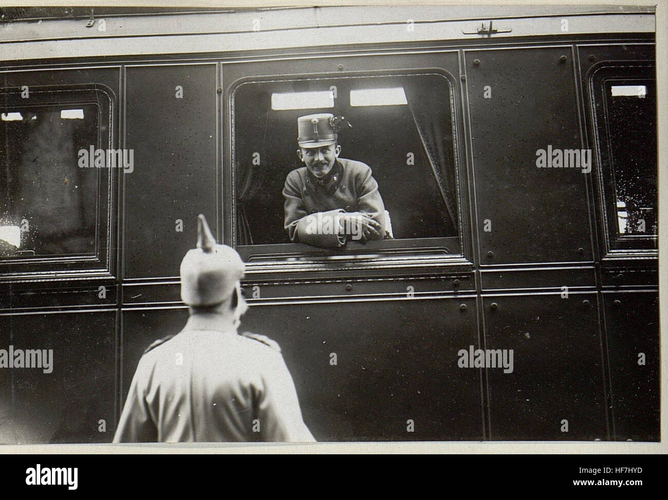 This historical image depicts visits by high-ranking officers and ...