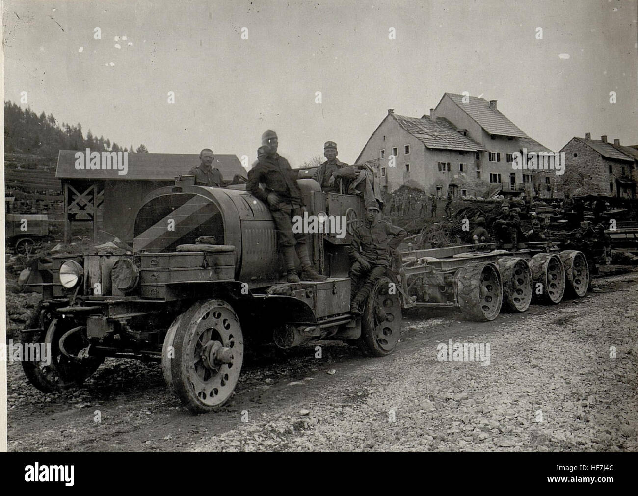 The image shows the mounting of a 42 cm howitzer during World War I in ...