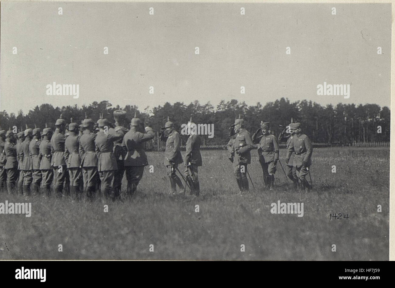 This image depicts high-ranking military officers and monarchs visiting ...