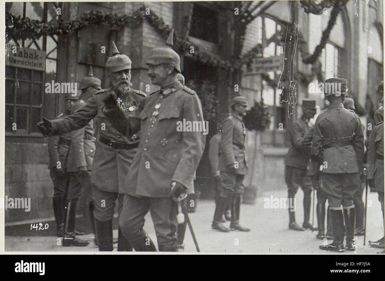 This image depicts high-ranking military officers and monarchs visiting ...