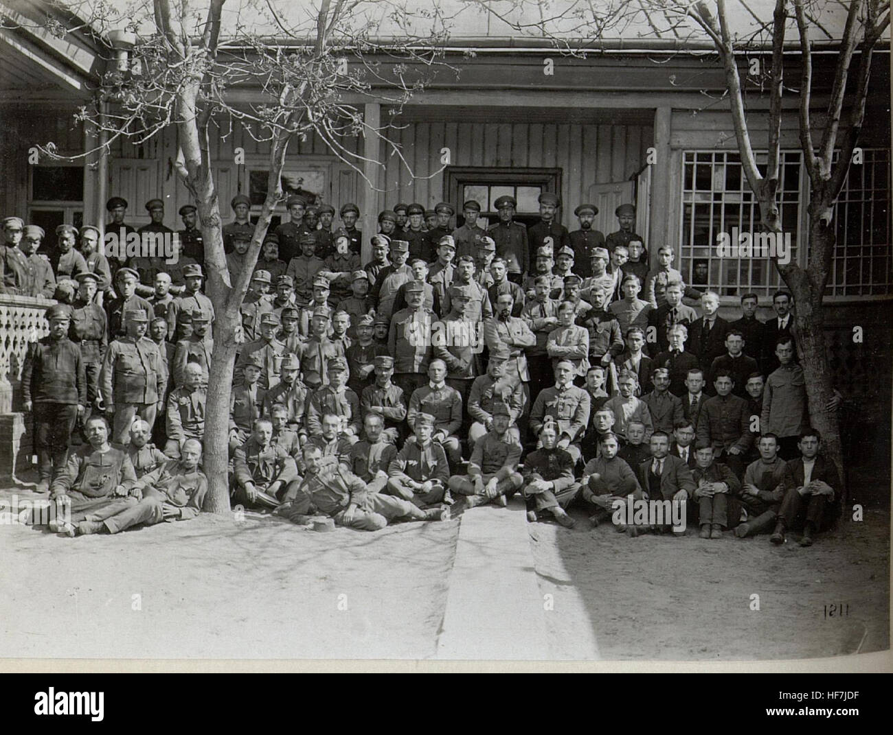 This photograph shows the production of boots and shoes for the Austro ...