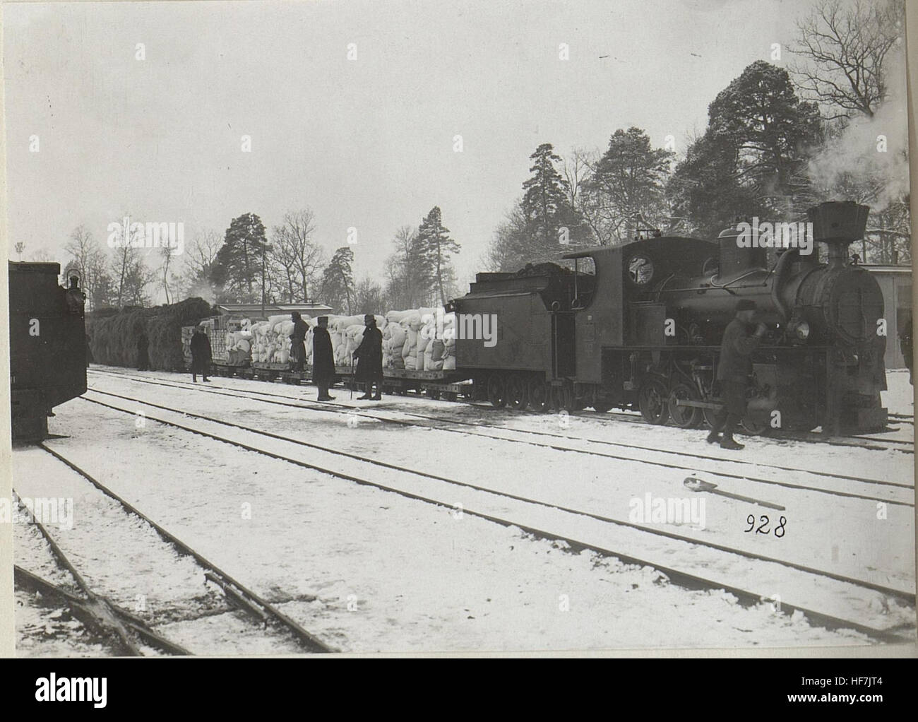 A historical image from World War I, showing loading activities in ...