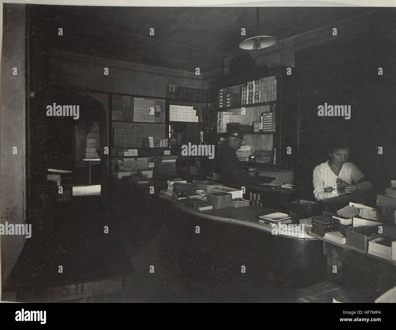 This image captures a wartime sales office during World War I, used by ...