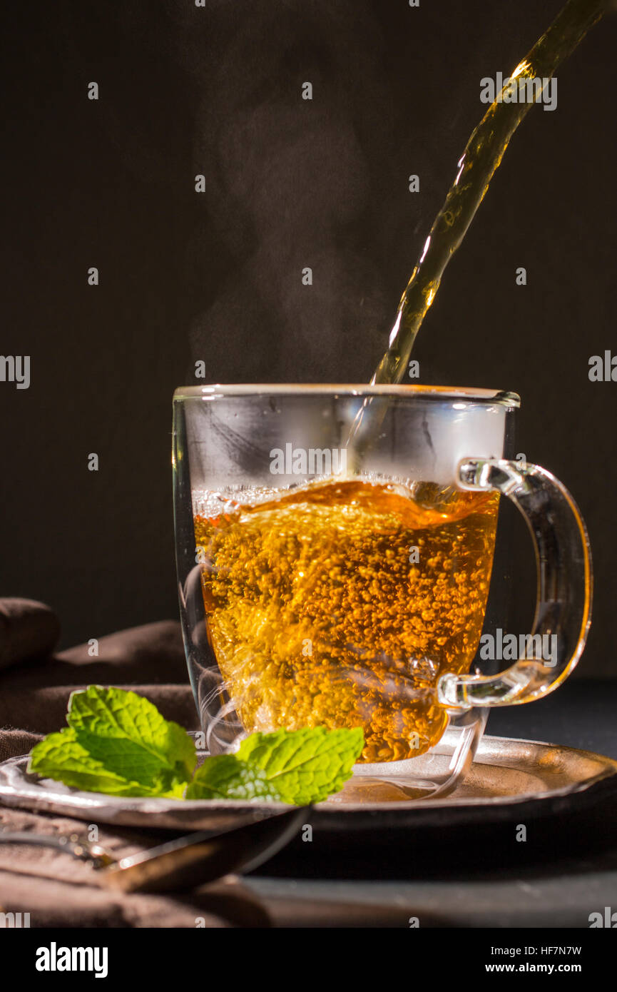 Tea pouring hi-res stock photography and images - Alamy