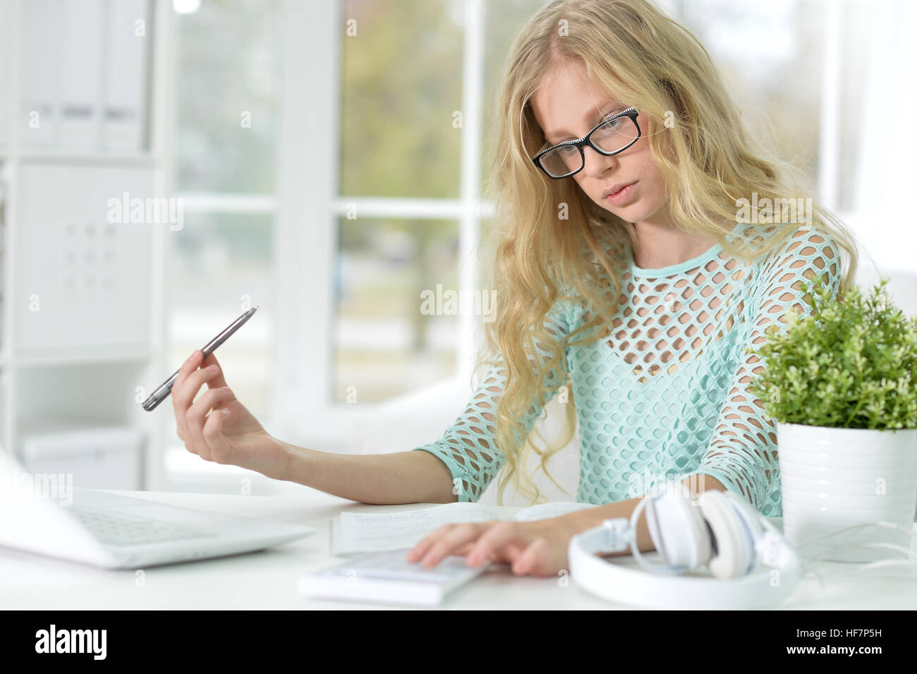 teenager girl doing homework Stock Photo - Alamy