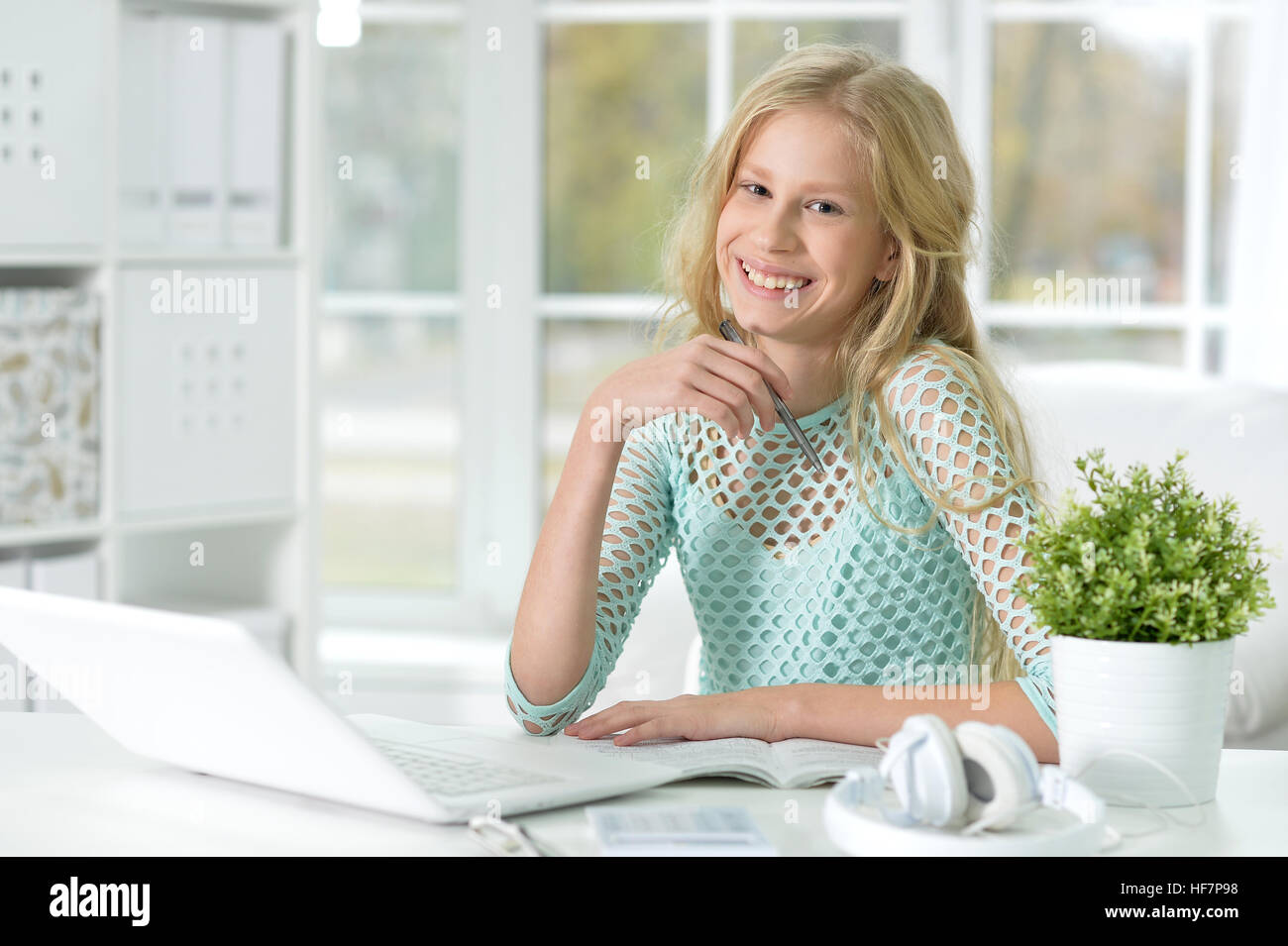 girl using laptop Stock Photo - Alamy