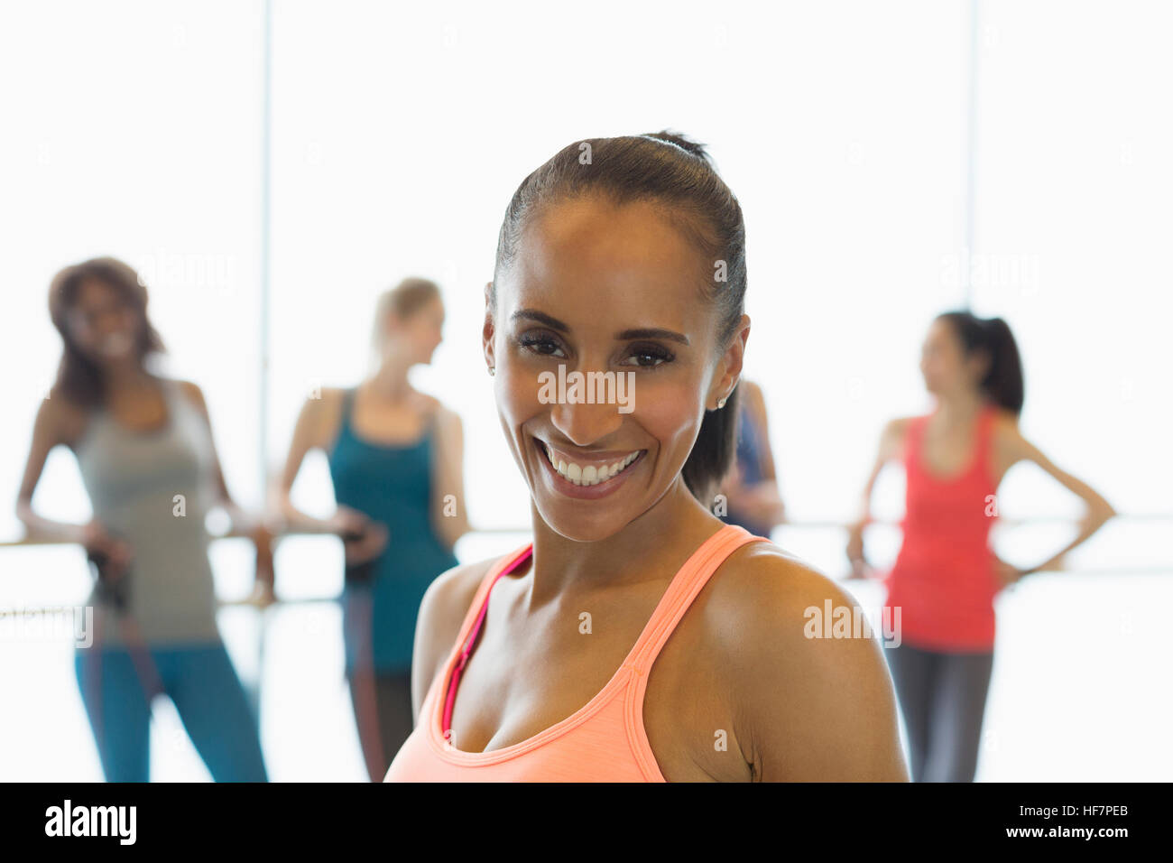 Portrait smiling woman in exercise class gym studio Stock Photo - Alamy