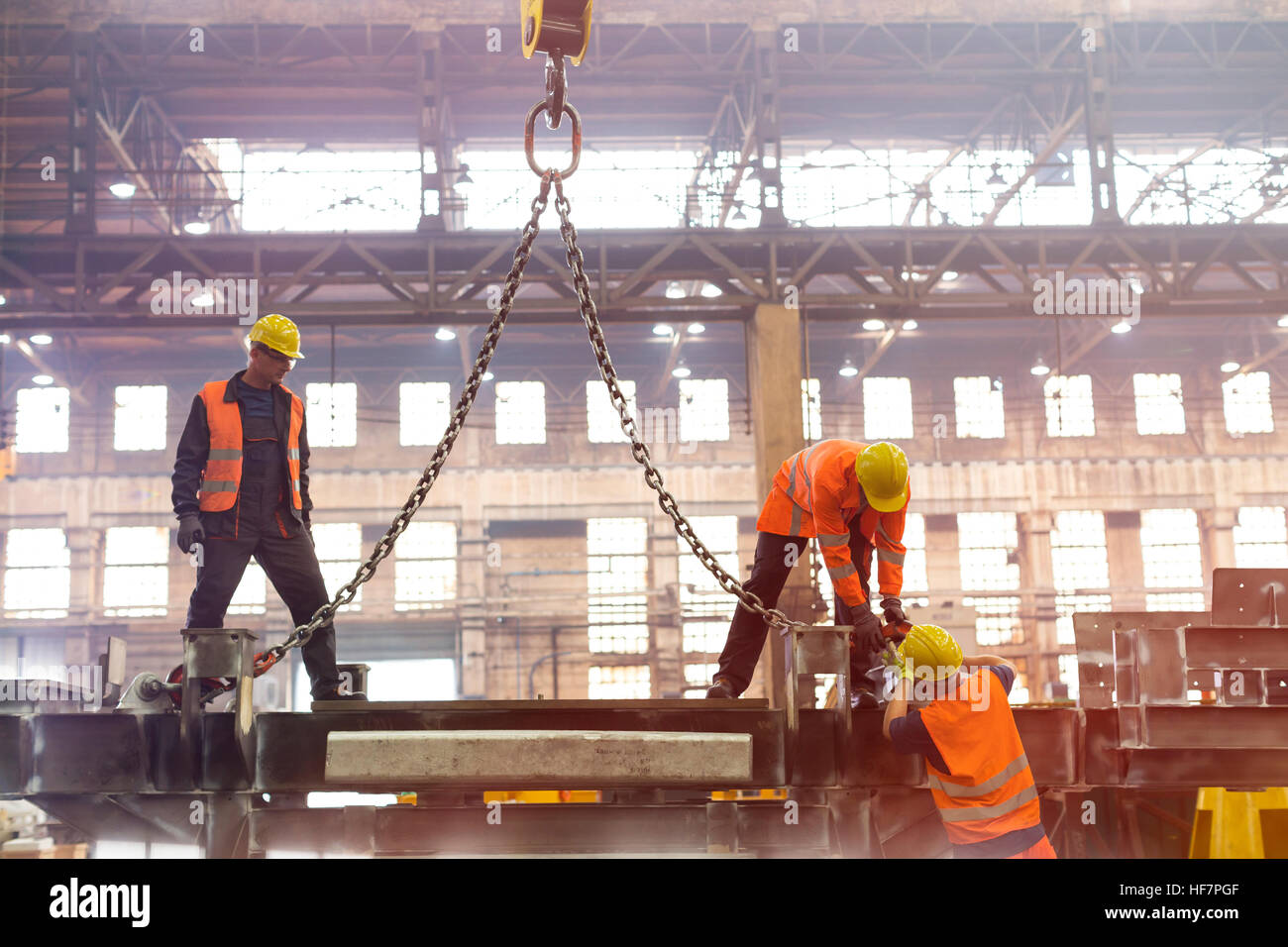 Chain of workers hi-res stock photography and images - Alamy