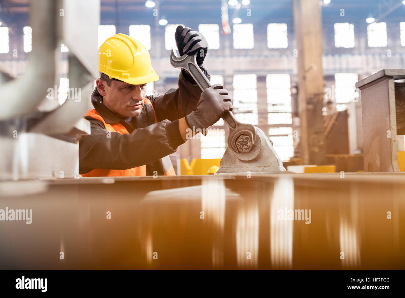 Worker holding wrench tool hi-res stock photography and images - Alamy