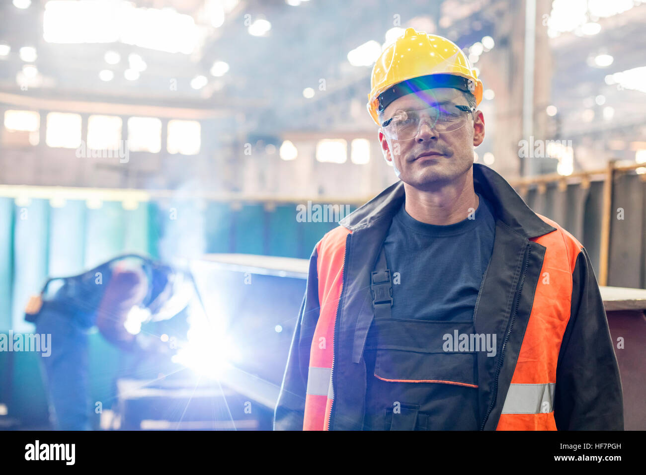 Portrait confident steel worker in factory Stock Photo - Alamy