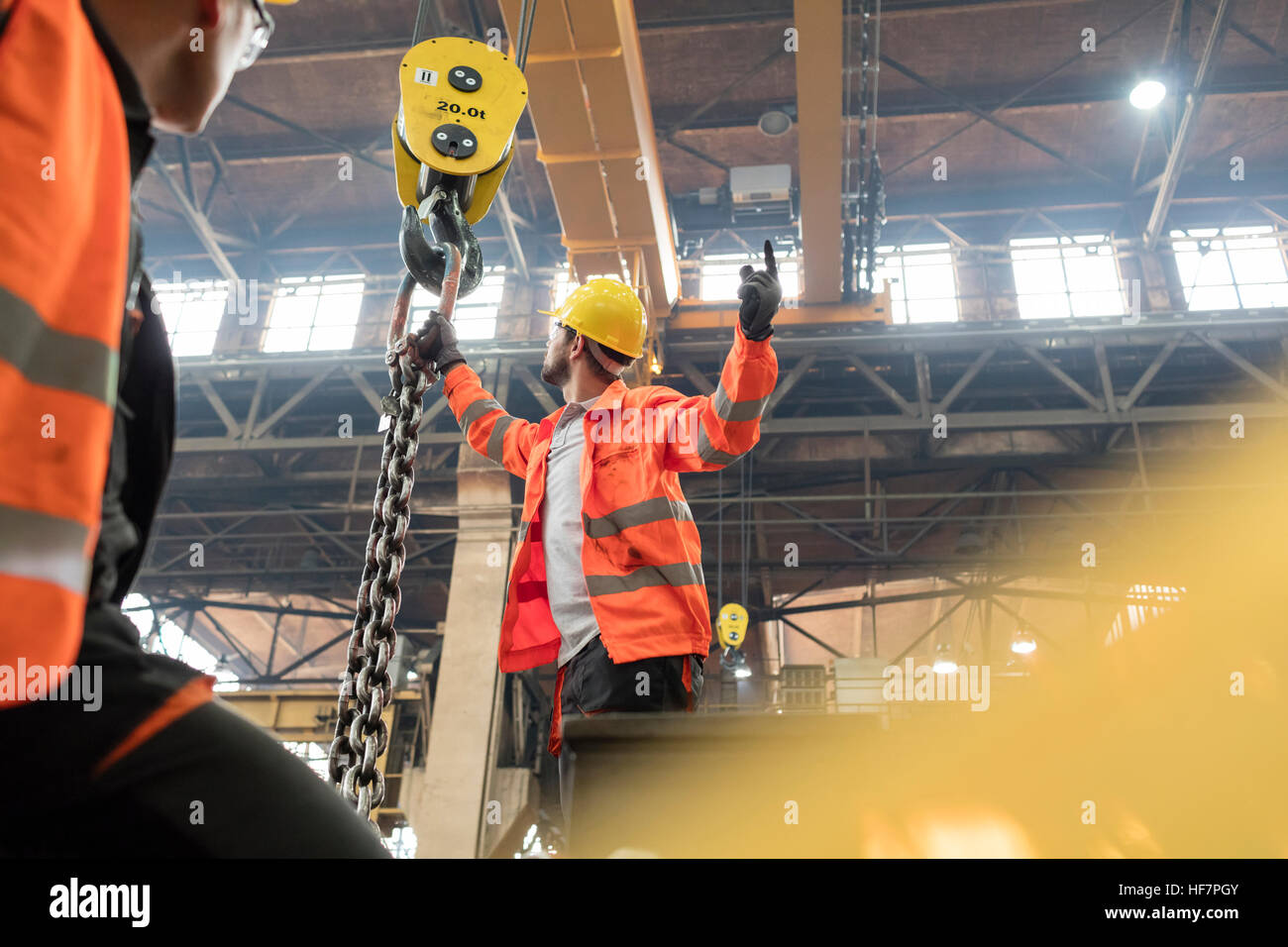 Chain of workers hi-res stock photography and images - Alamy