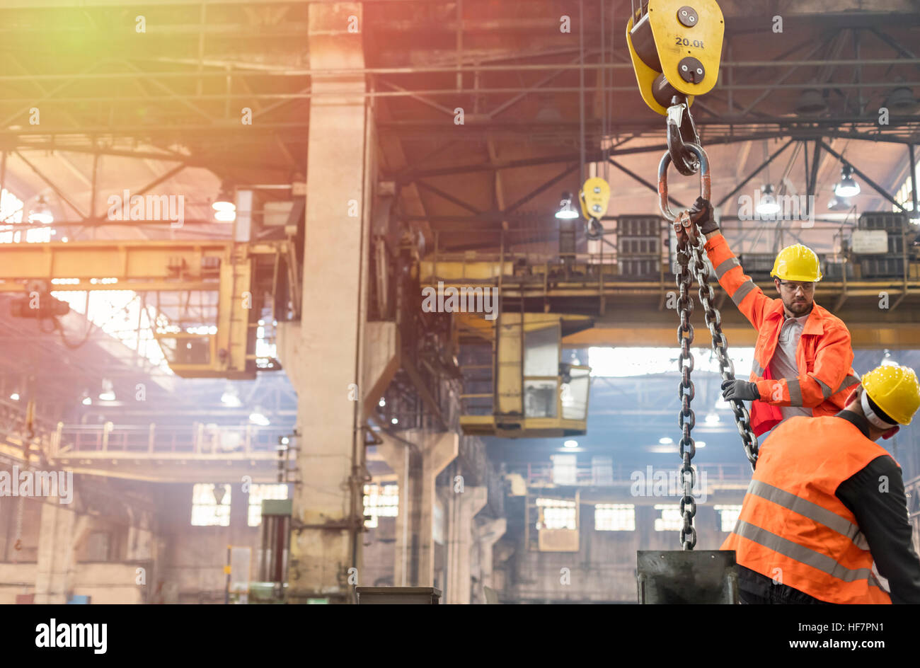 Two crane arms hi-res stock photography and images - Alamy