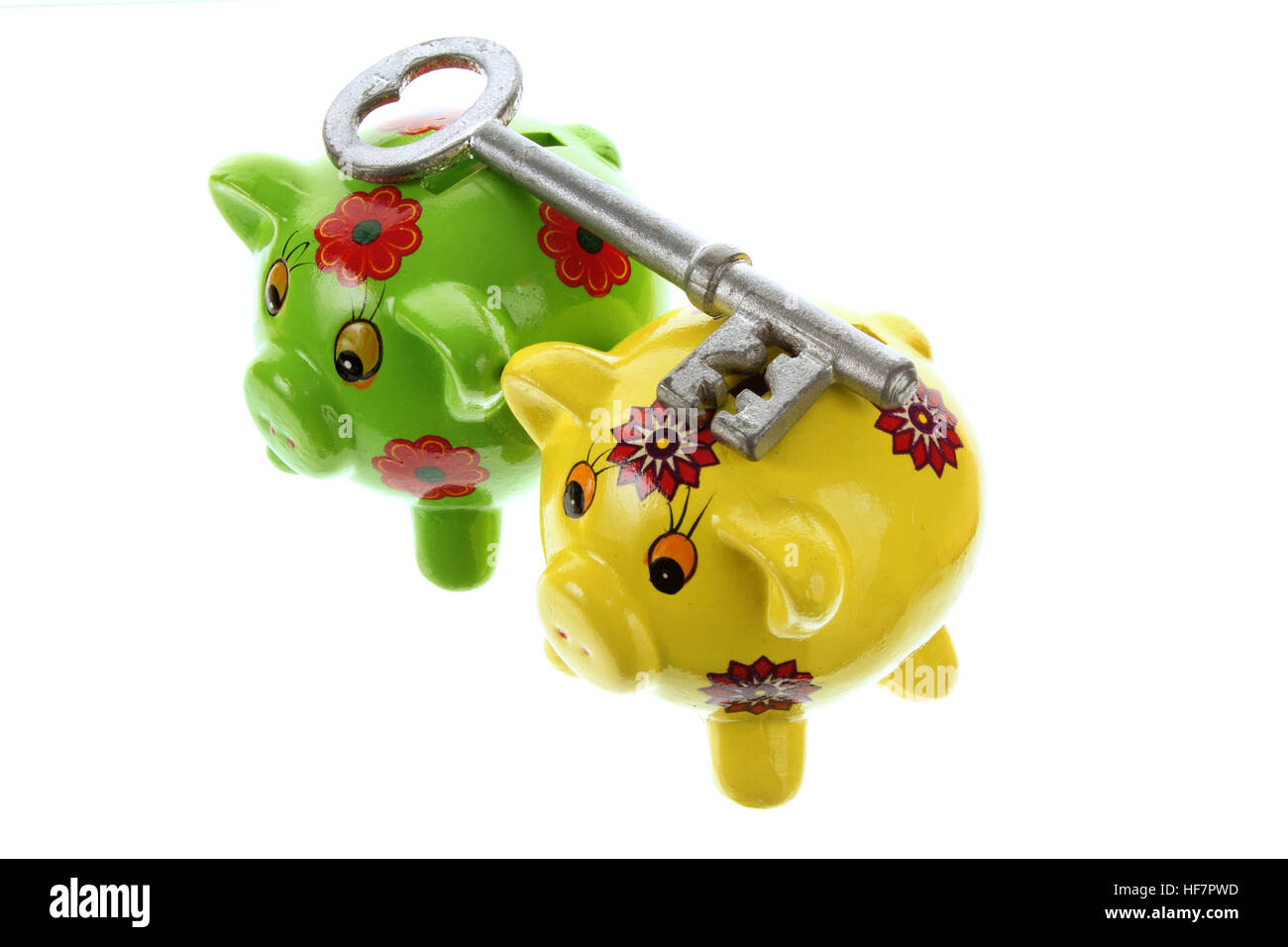 Piggy Banks and Key Stock Photo - Alamy