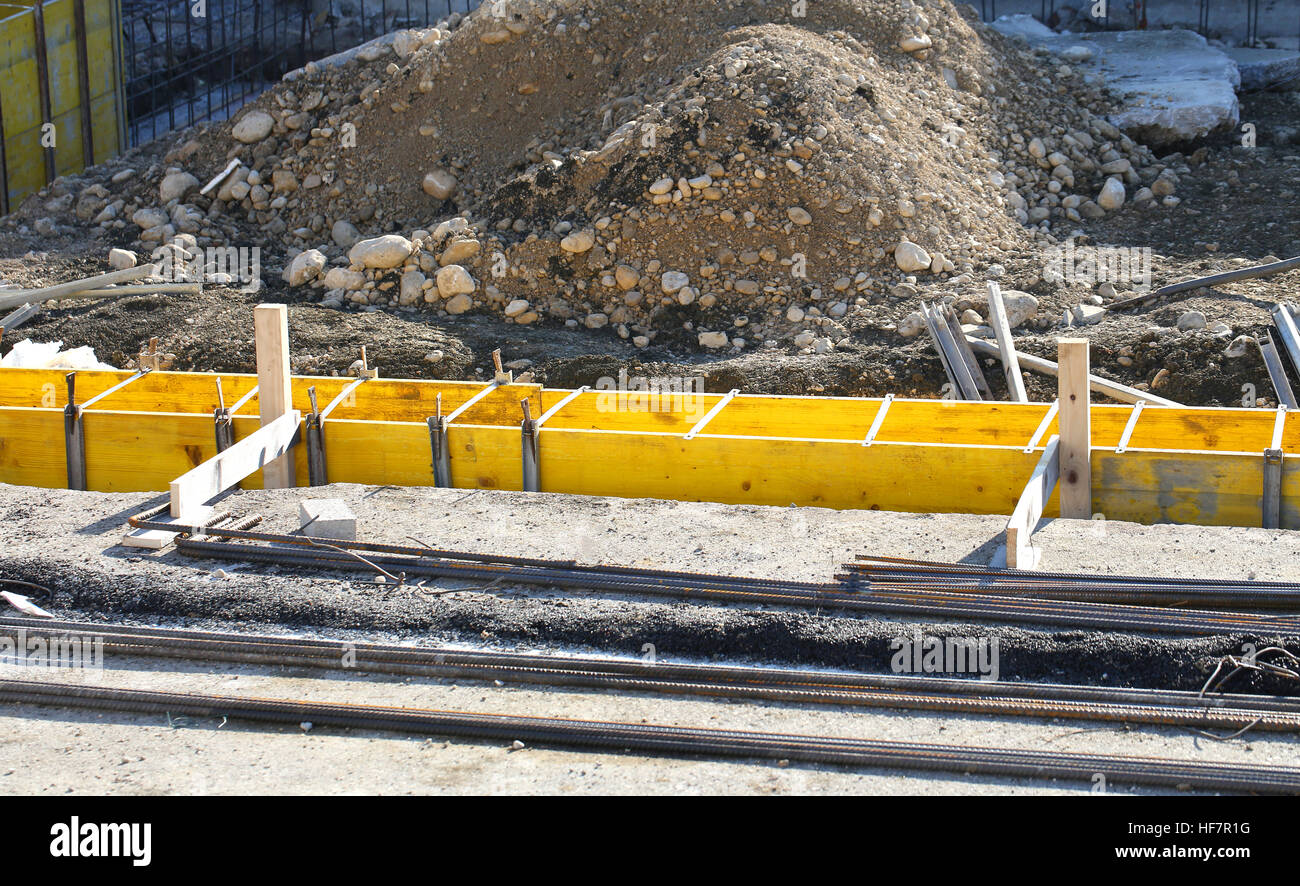 heap of earth and other building material during the construction of ...