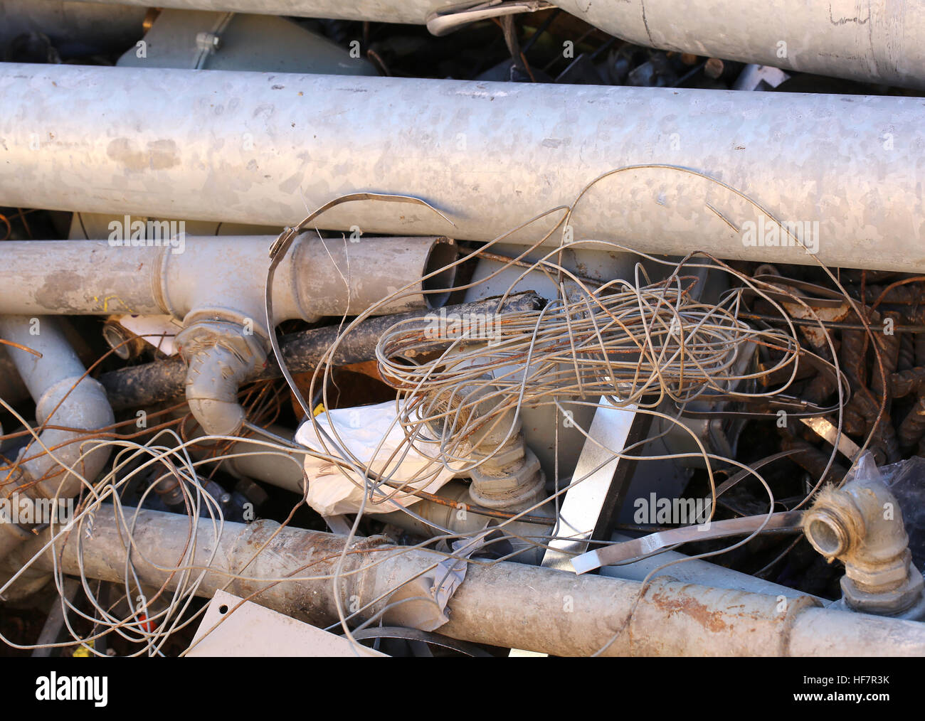 rusty old iron pipes in a landfill to recycle Stock Photo - Alamy