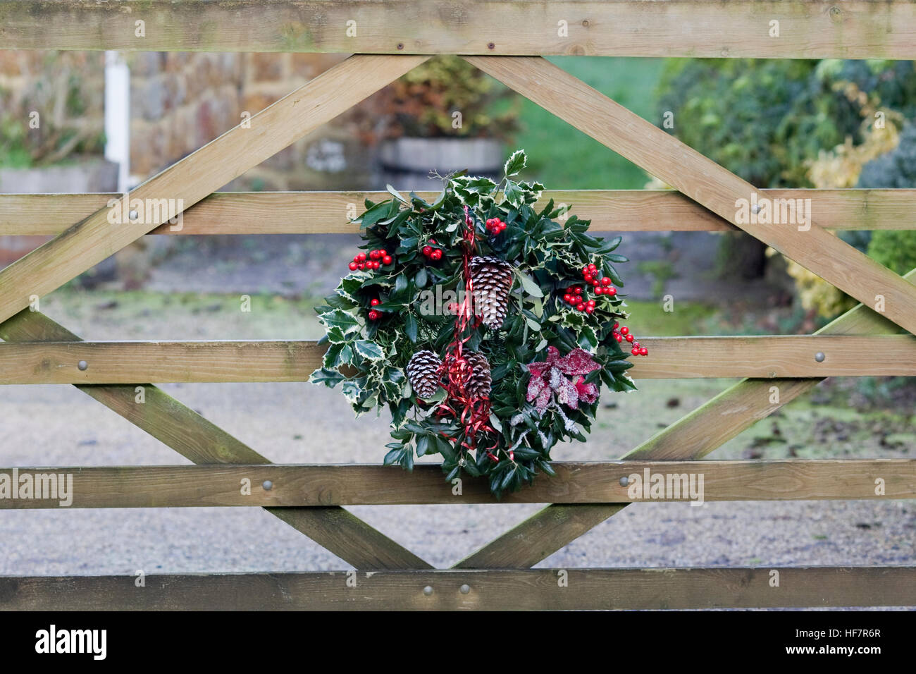 A Christmas Wreath on a wooden gate Stock Photo - Alamy