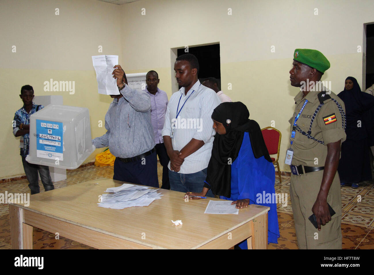 Electoral officials in Baidoa count votes for the Lower House of the ...
