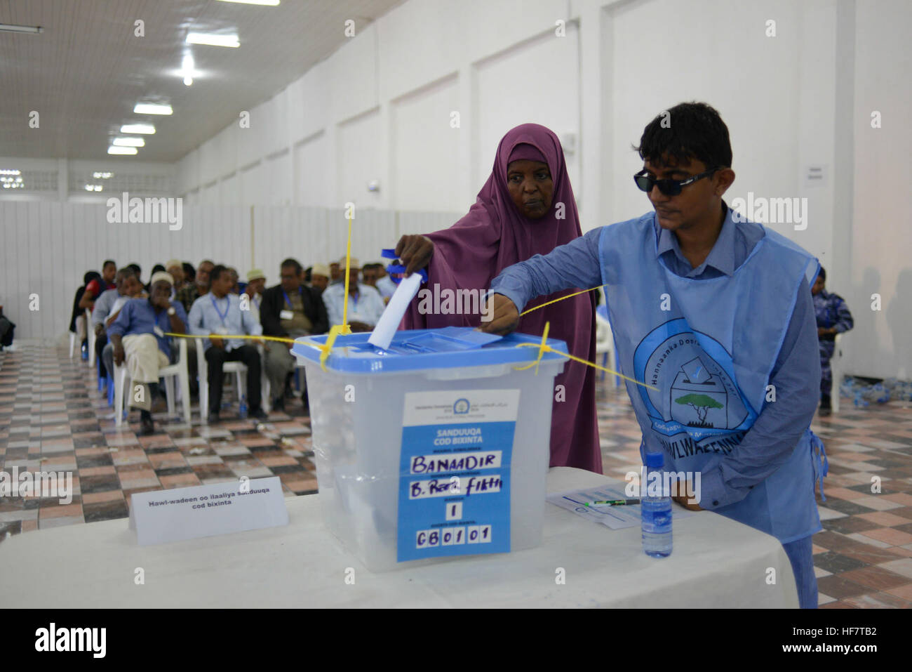 A delegate votes in the electoral process for the House of the People ...