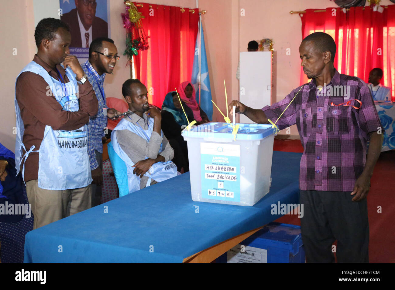 A delegate casts their vote during the electoral process in Jowhar ...