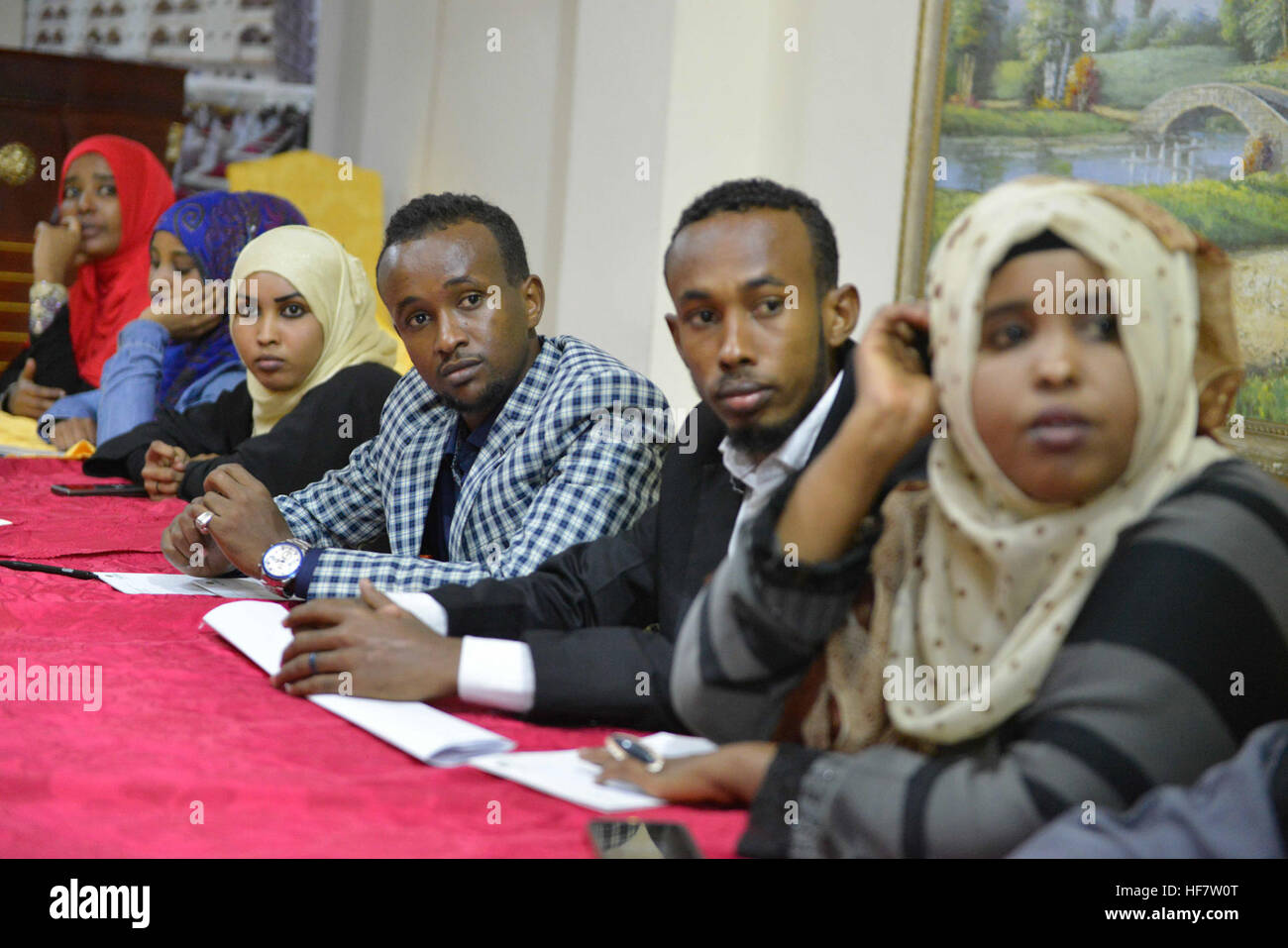 Young people attend a conference in Mogadishu on October 10, 2016 ...