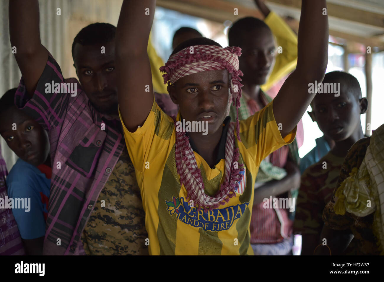Somali men stand in the marketplace of El-Baraf town on October 26 ...