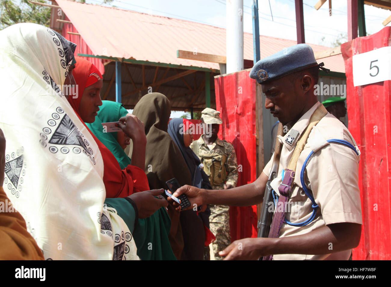 On November 13, 2016, a member of the Somali Police Force (SPF) checks ...