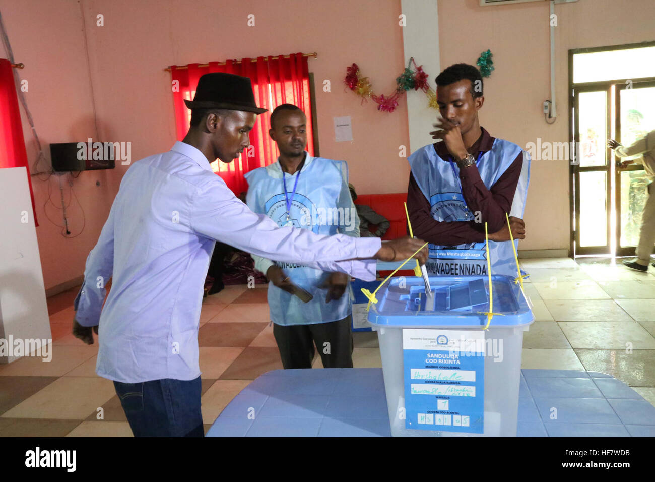 A delegate casts their vote during the electoral process for the Lower ...