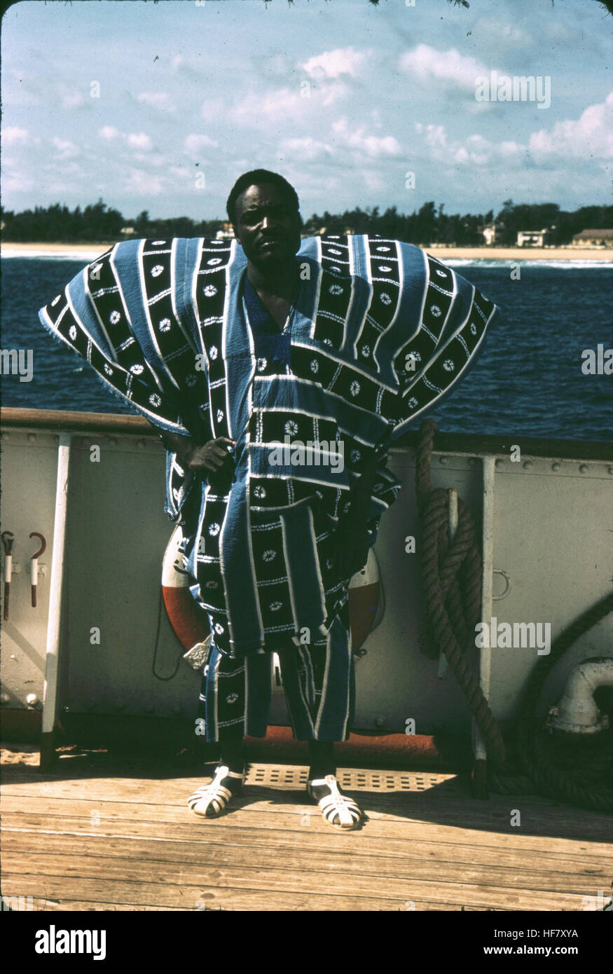 This image shows a man from Gabon, Africa, dressed in traditional ...